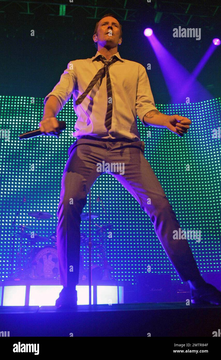 Scott Weiland, lead singer of Stone Temple Pilots, performs with a ...