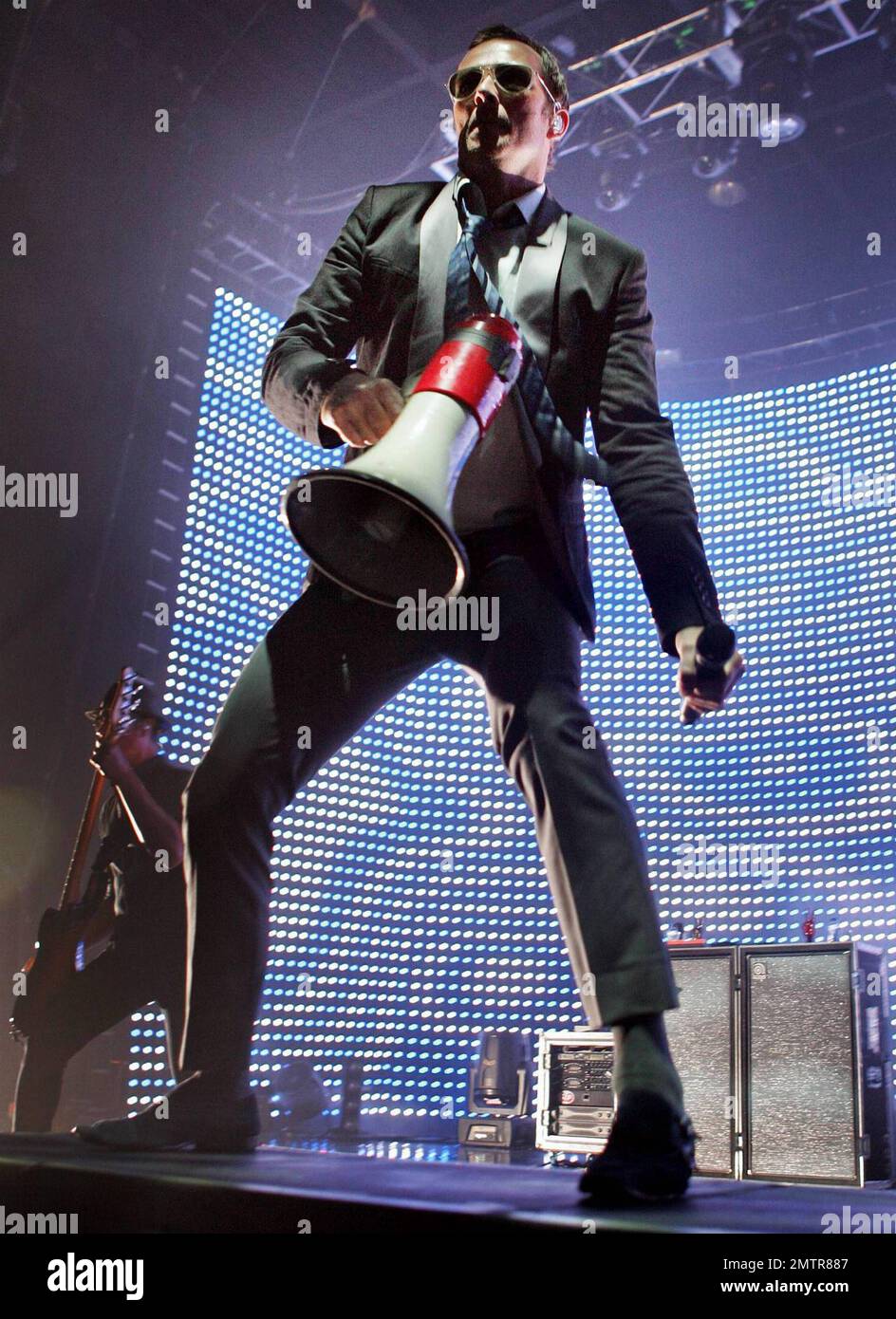 Scott Weiland, lead singer of Stone Temple Pilots, performs with a ...
