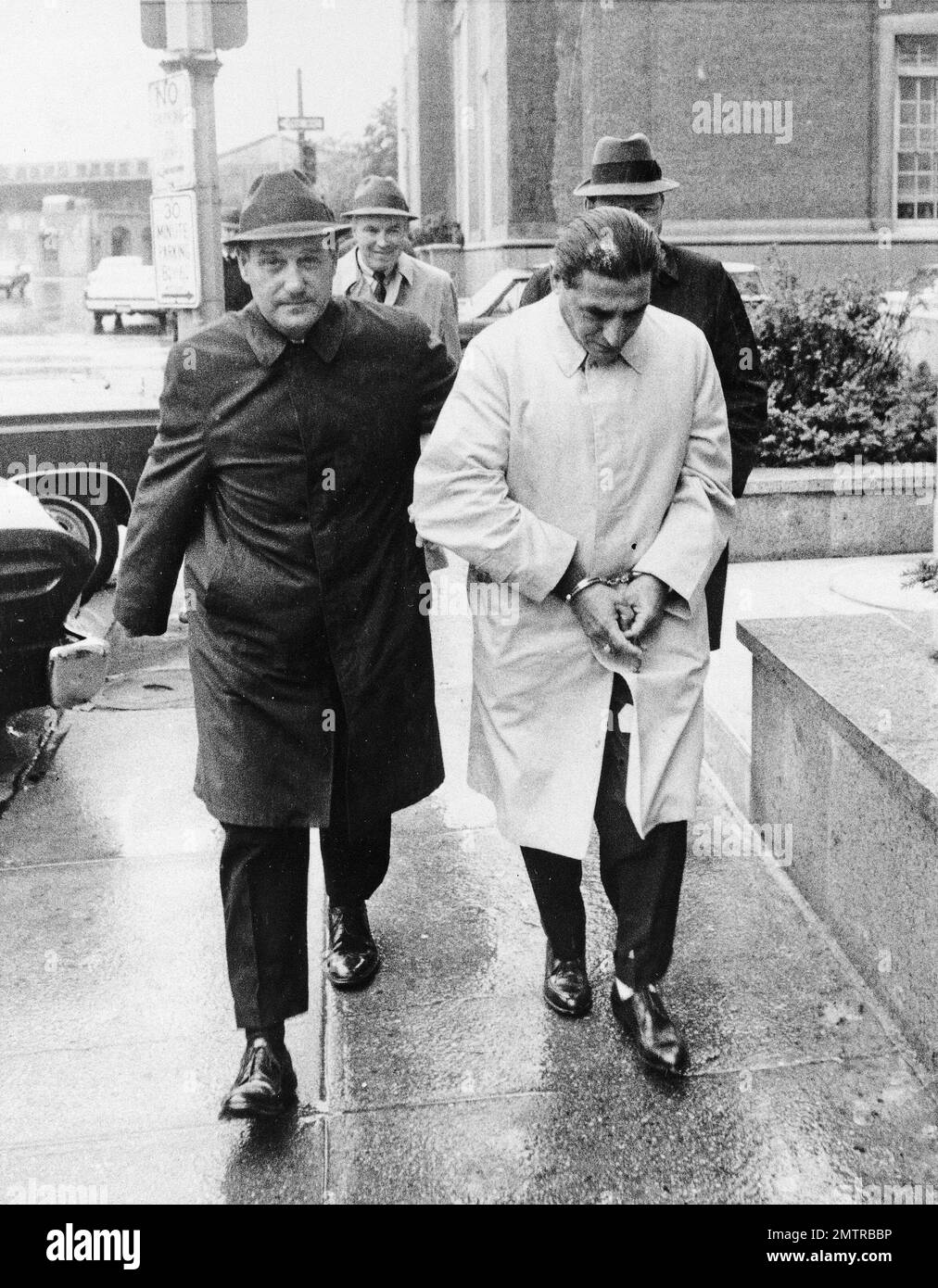Raymond Patriarca in handcuffs is escorted to Federal District court in ...