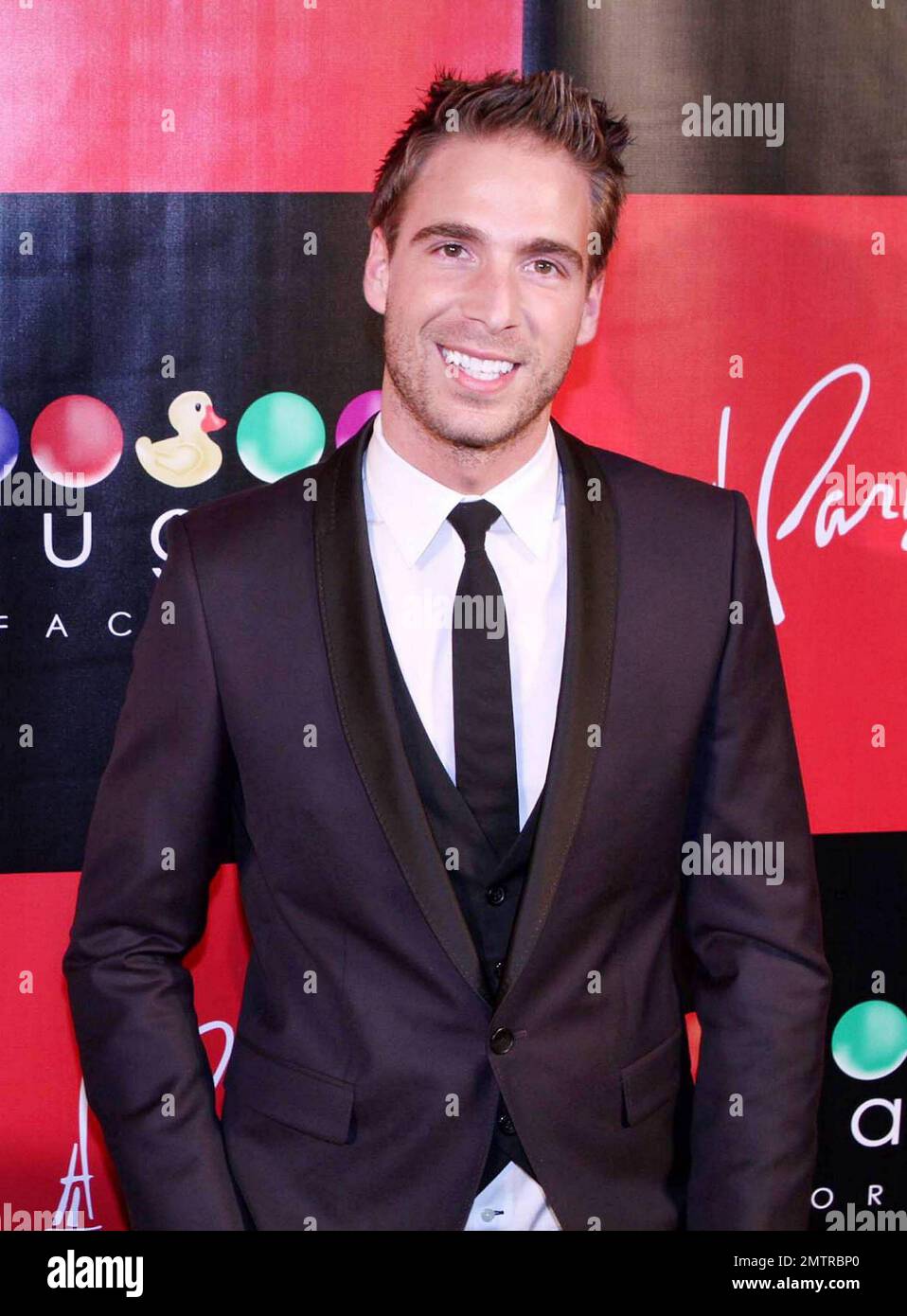 Simon Huck poses for photographers at the grand opening of the Sugar ...