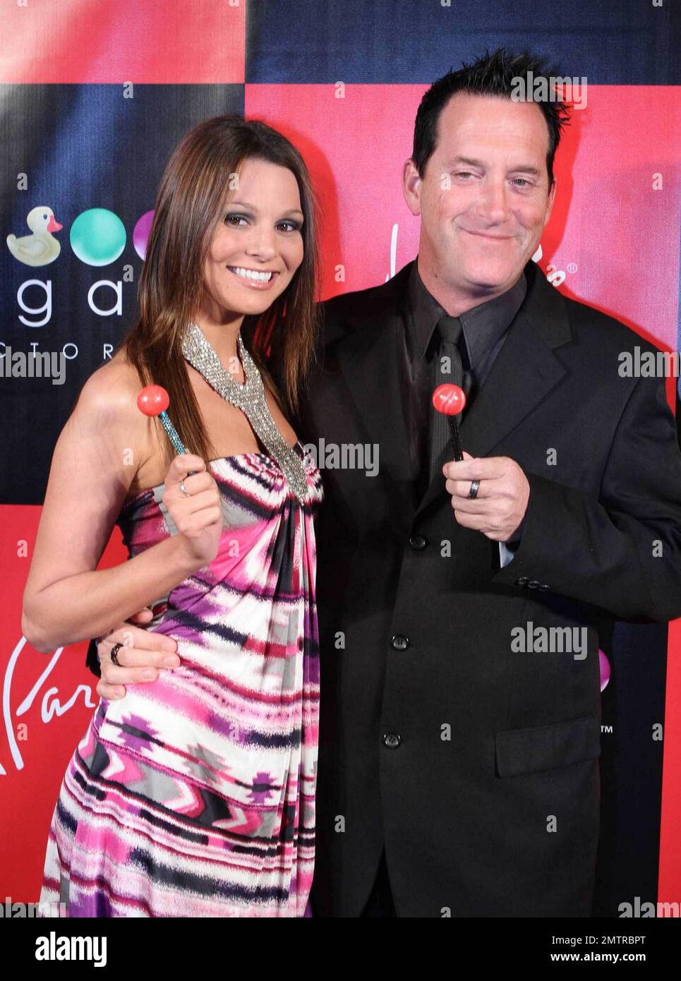 Anthony Cools and Ashley Miele pose for photographers at the grand ...