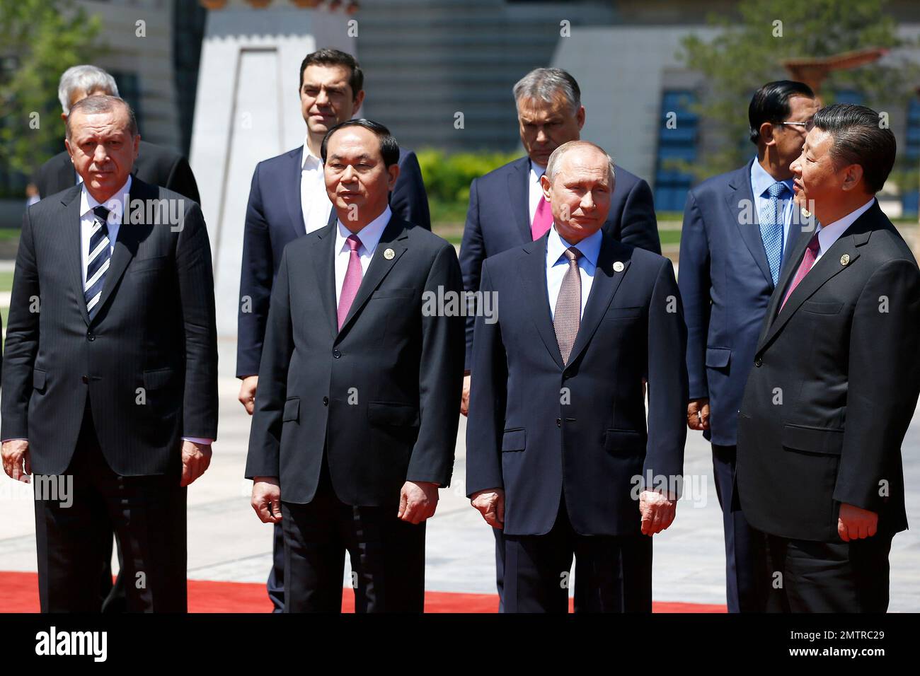 Chinese President Xi Jinping, front right, and other leaders pose for a ...