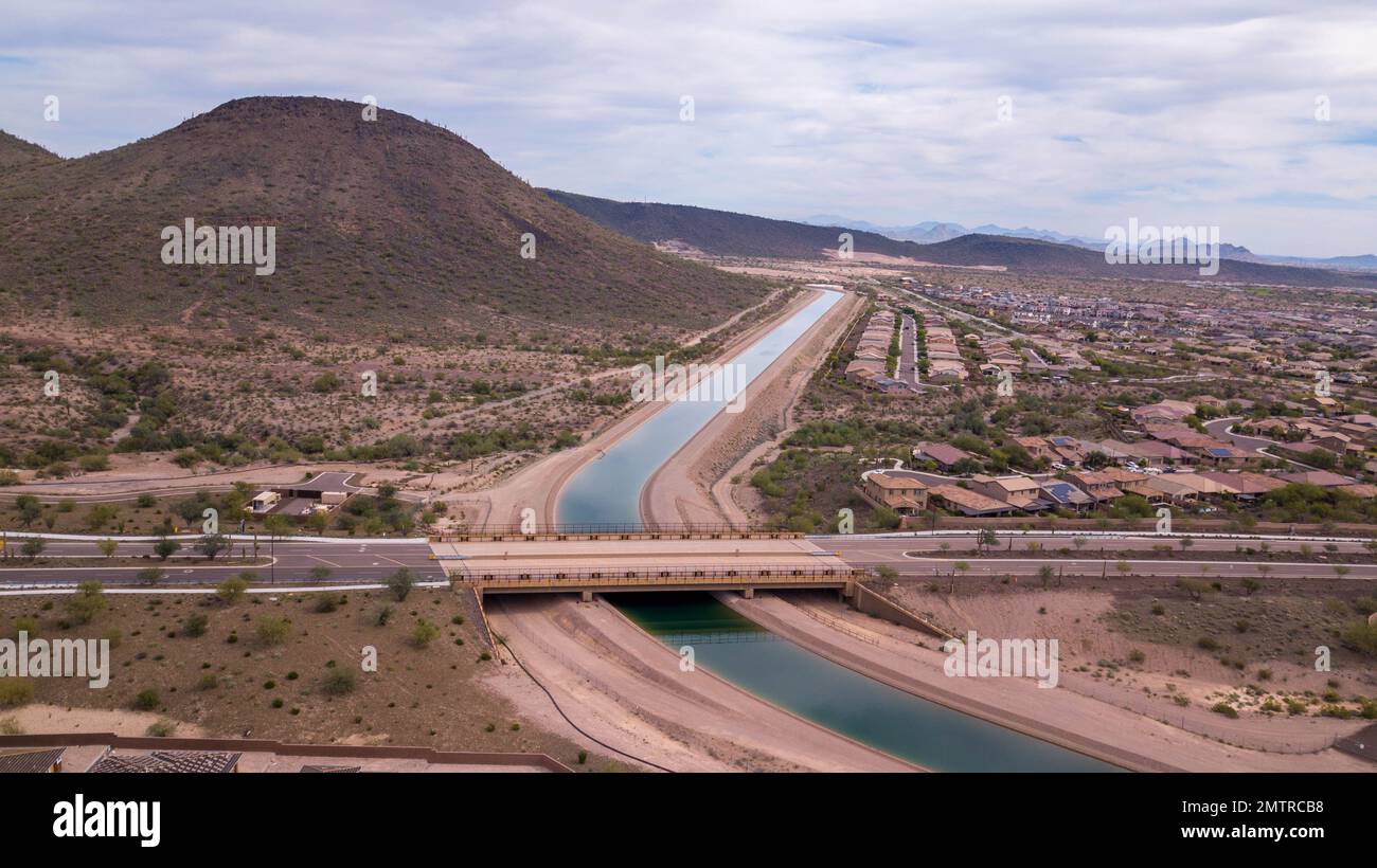 An aerial view of the Central Arizona Project and new homes in ...