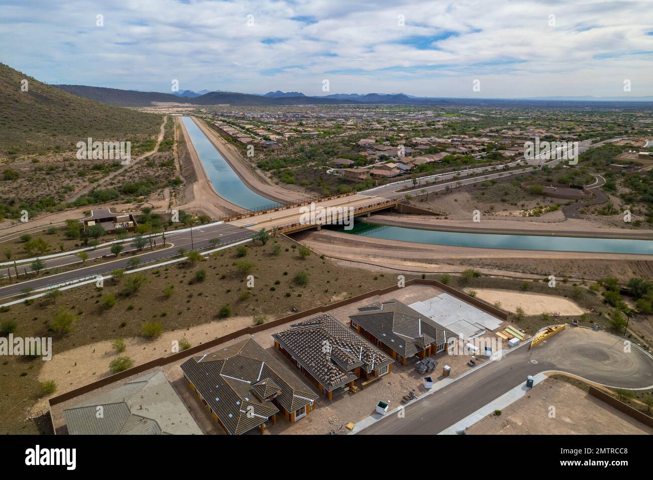 An aerial view of the Central Arizona Project and new homes in ...