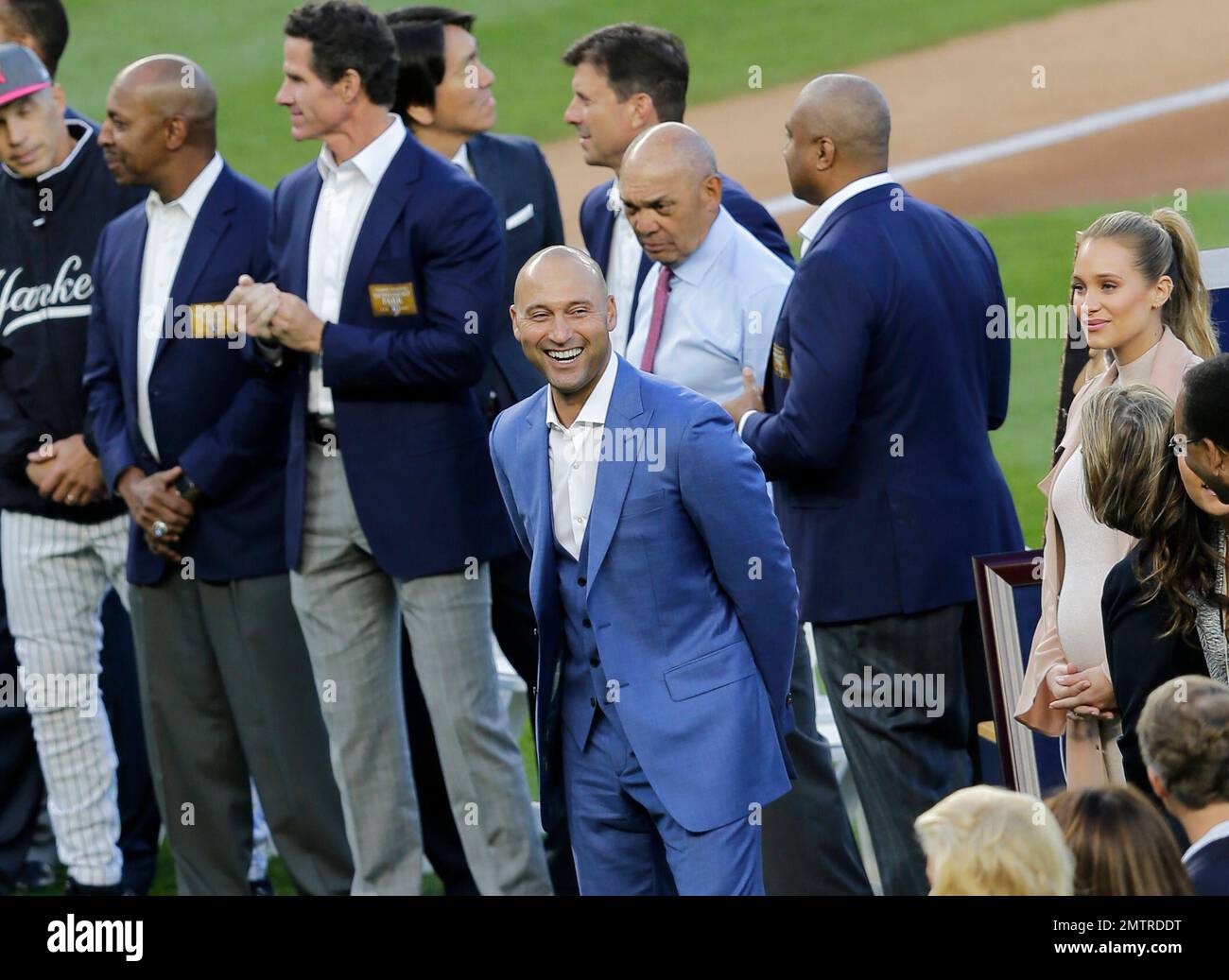 Former New York Yankees' Derek Jeter smiles during a ceremony retiring ...