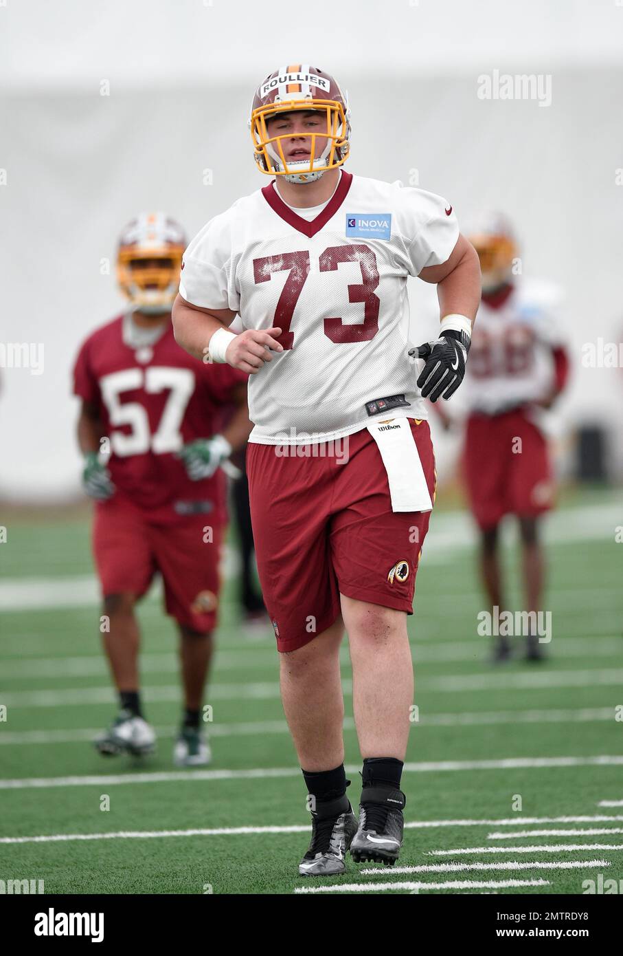 Washington Redskins offensive lineman Chase Roullier (73) warms up ...