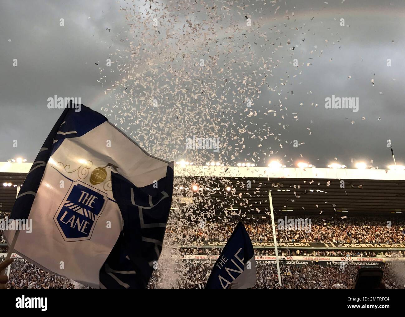 A rainbow appears as fans invade the pitch after the English Premier ...