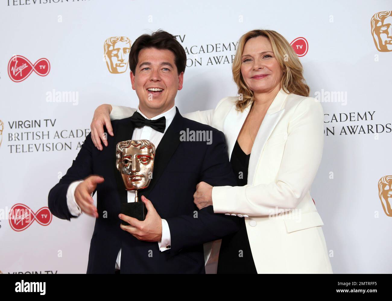 Comedian Michael McIntyre poses with his Bafta for Best Entertainment ...