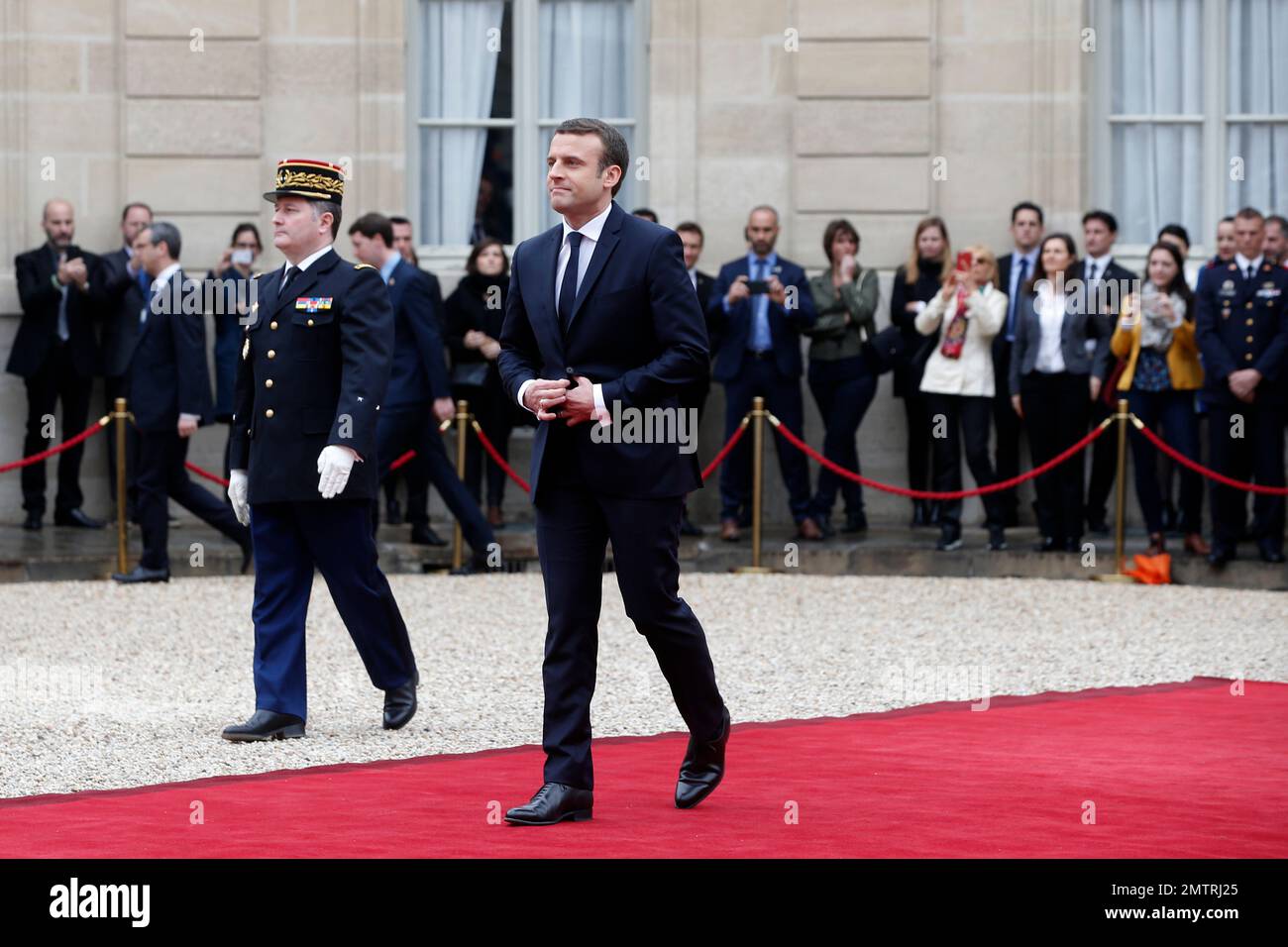Incoming French President Emmanuel Macron, center, arrives for his ...