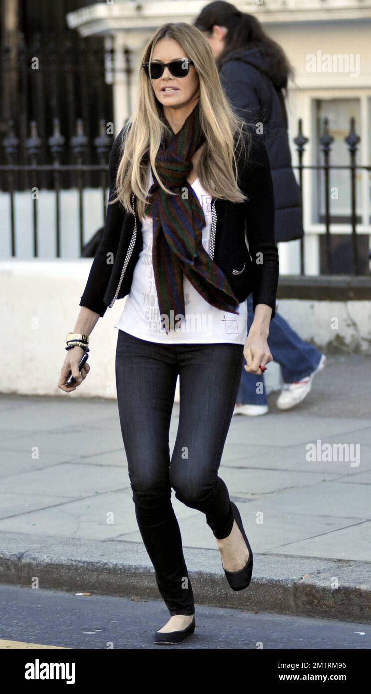 Elle MacPherson looks casually sophisticated while she's out and about ...