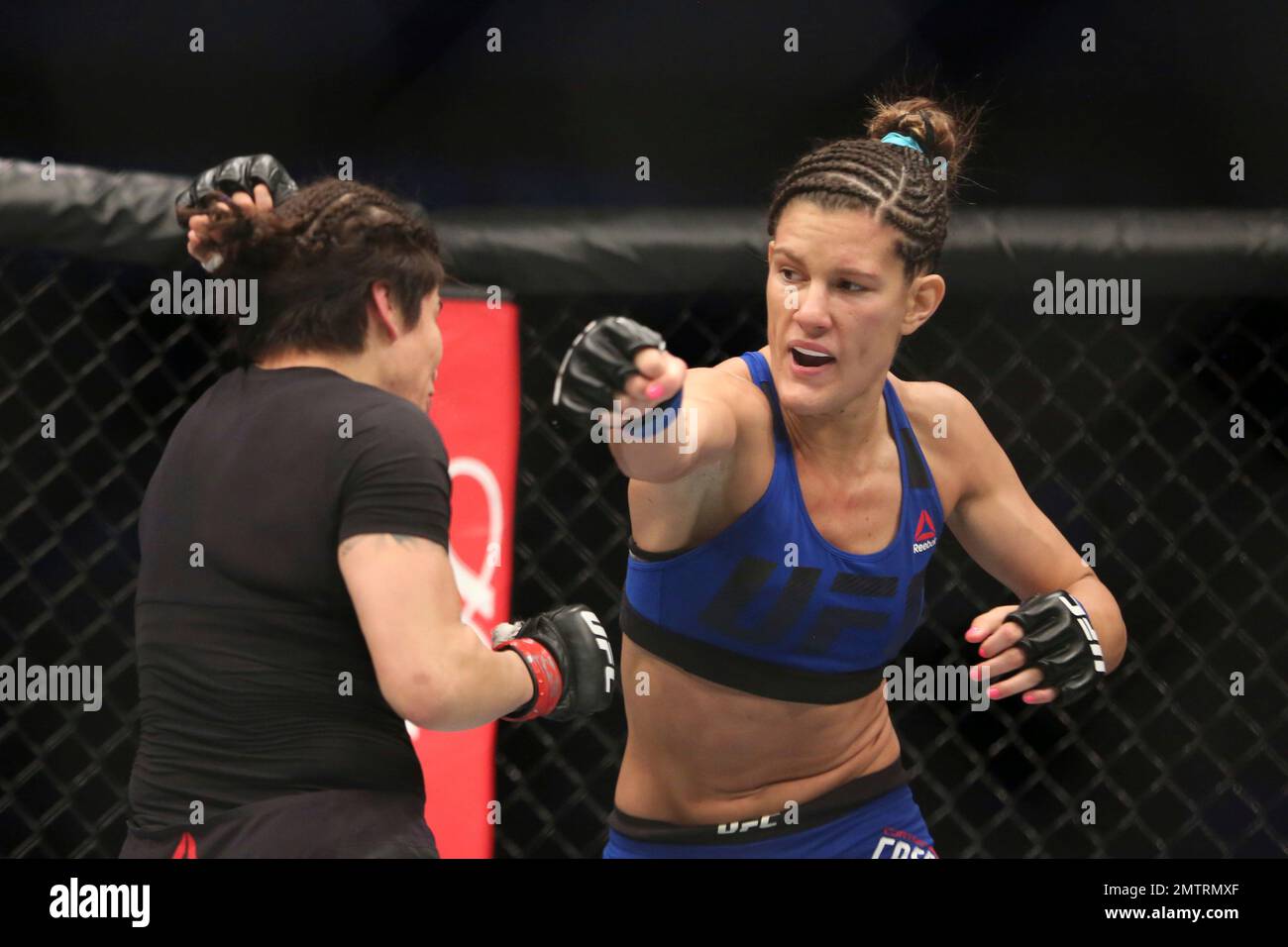 Cortney Casey right, fights Jessica Aguilar in a mixed martial arts ...