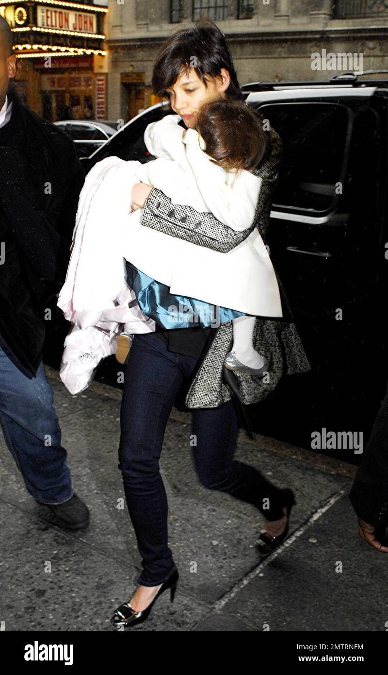 Katie Holmes arrives with daughter Suri at the Schoenfeld Theatre for ...