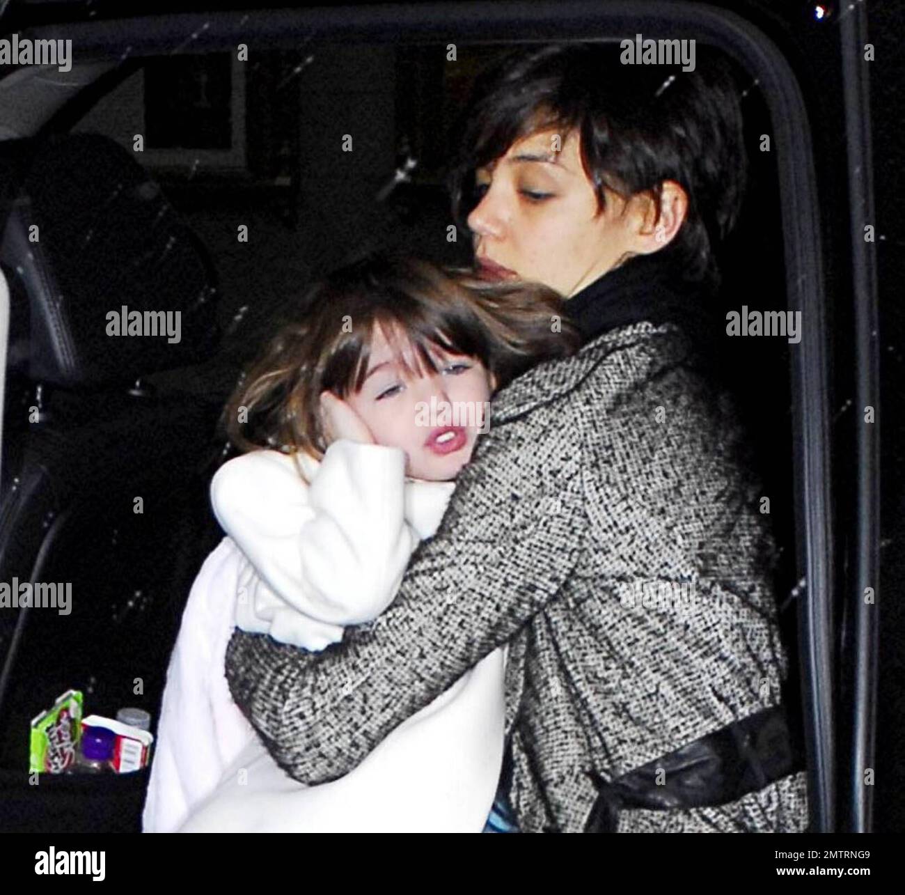 Katie Holmes arrives with daughter Suri at the Schoenfeld Theatre for ...