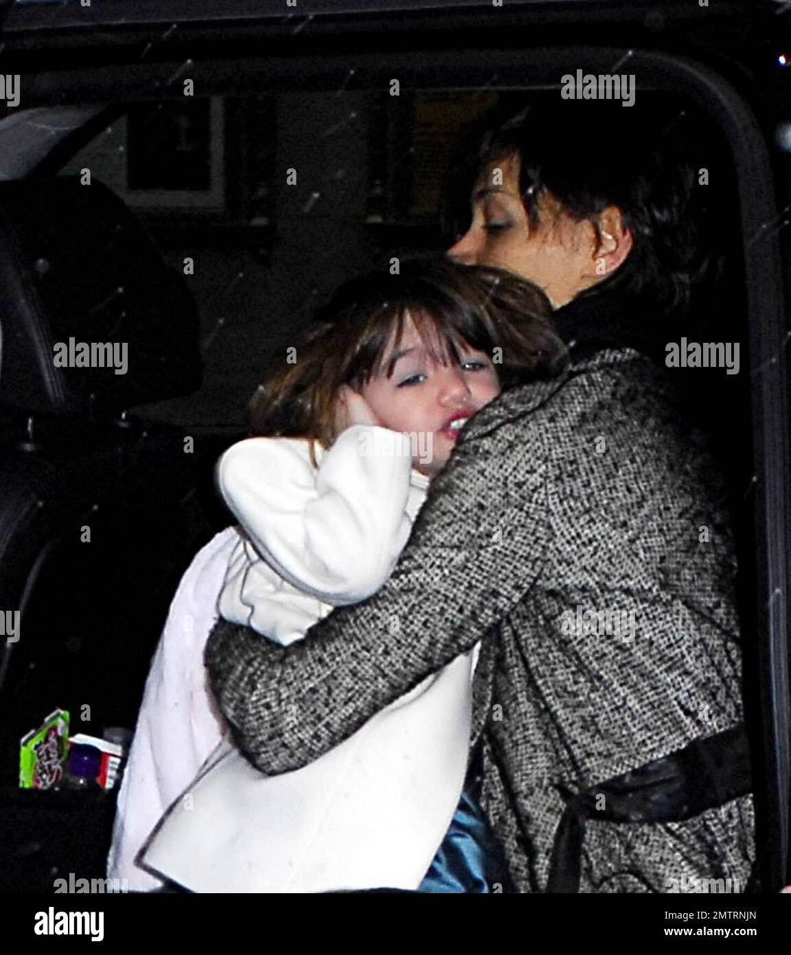 Katie Holmes arrives with daughter Suri at the Schoenfeld Theatre for ...