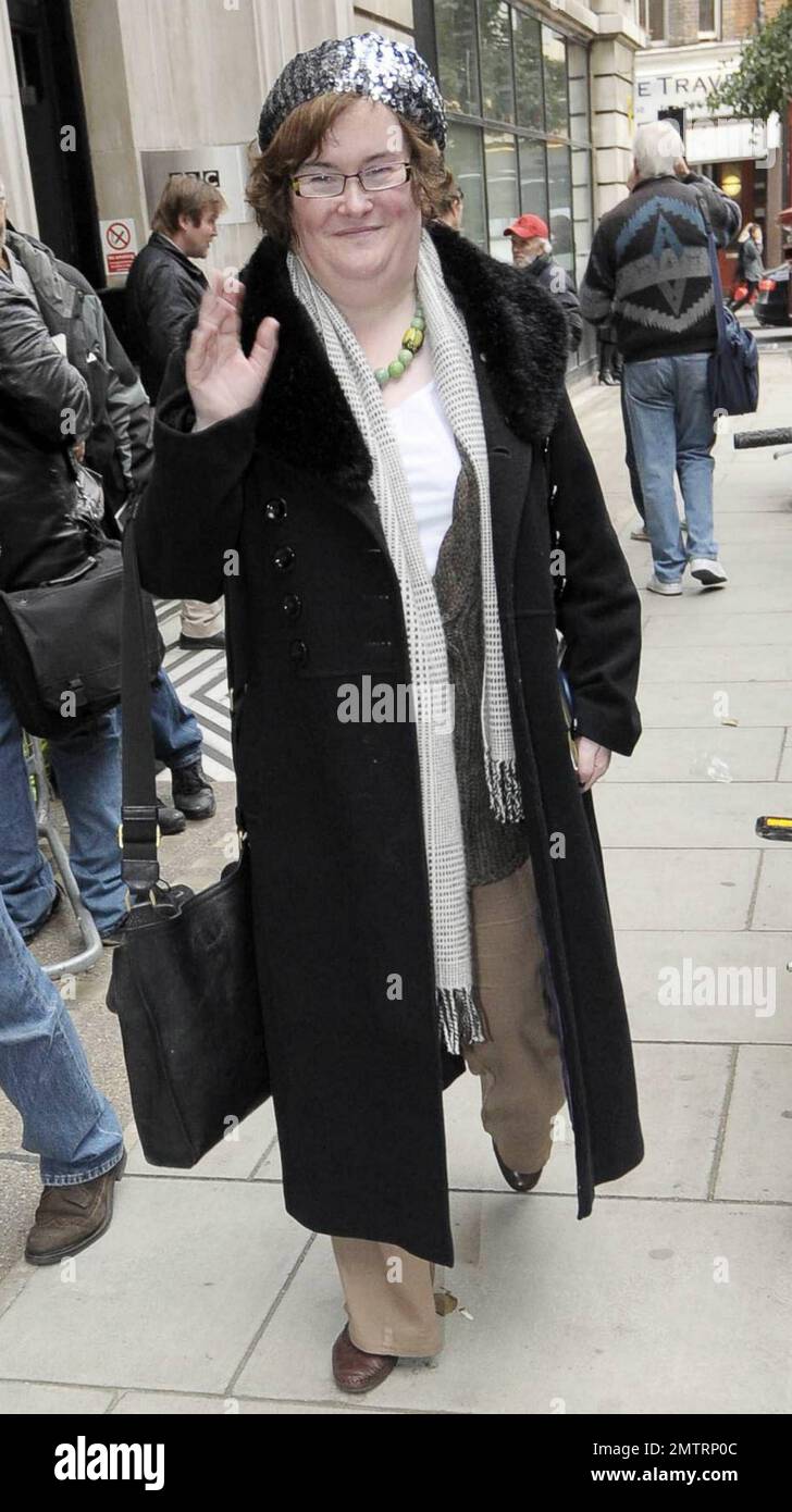 Singer Susan Boyle smiles and waves as she arrives at BBC Radio where ...