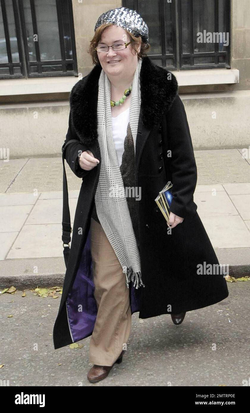Singer Susan Boyle smiles and waves as she arrives at BBC Radio where ...