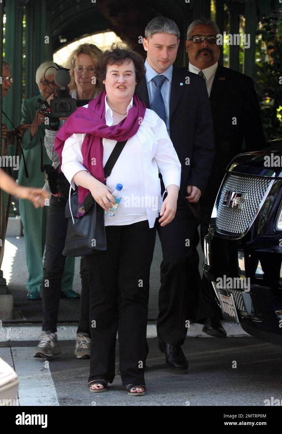 Susan Boyle is all smiles and seemingly playful as she arrives at her ...