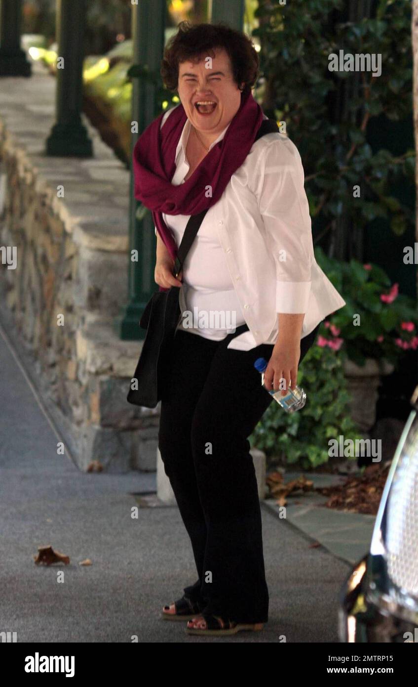 Susan Boyle is all smiles and seemingly playful as she arrives at her ...