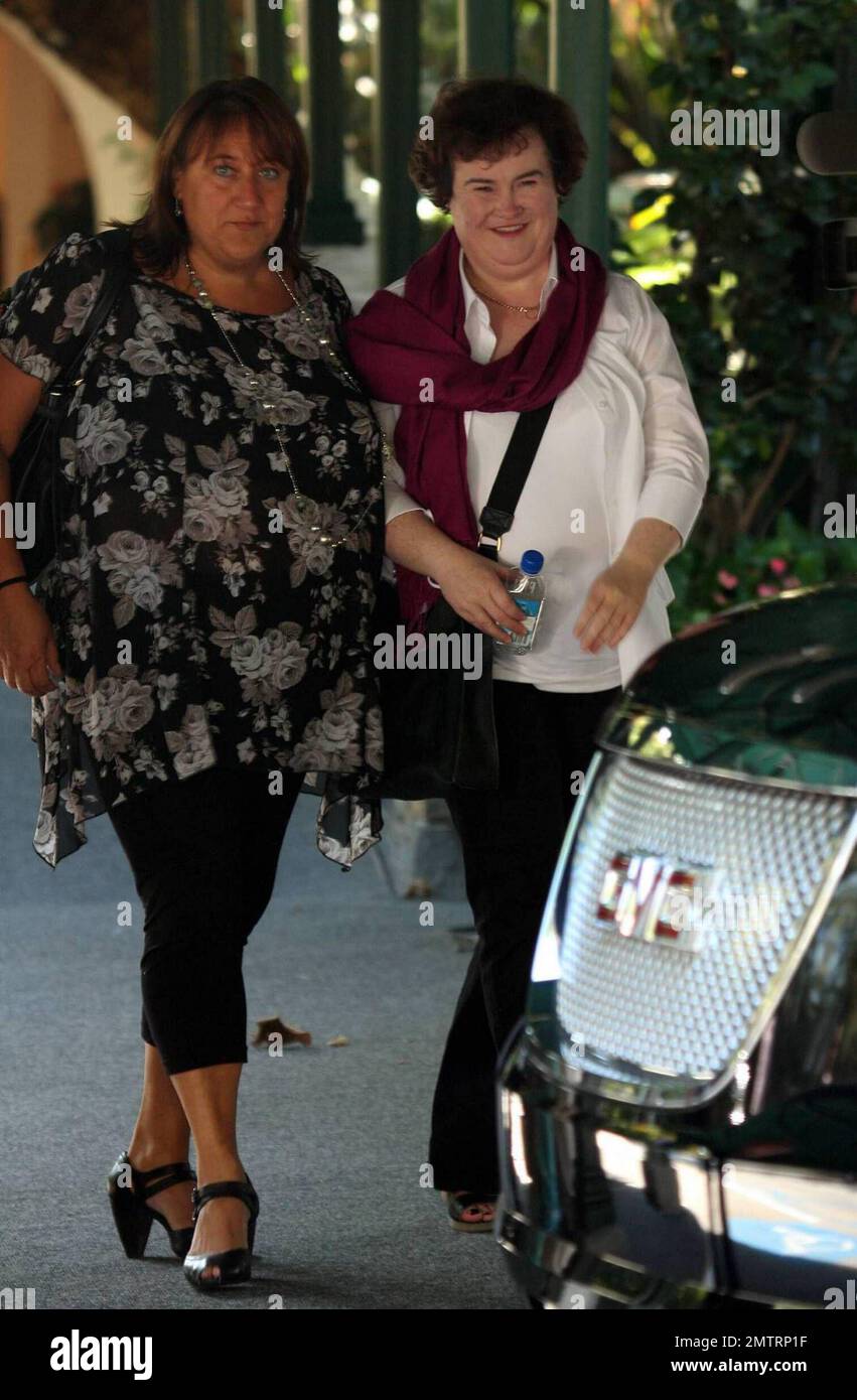 Susan Boyle is all smiles and seemingly playful as she arrives at her ...