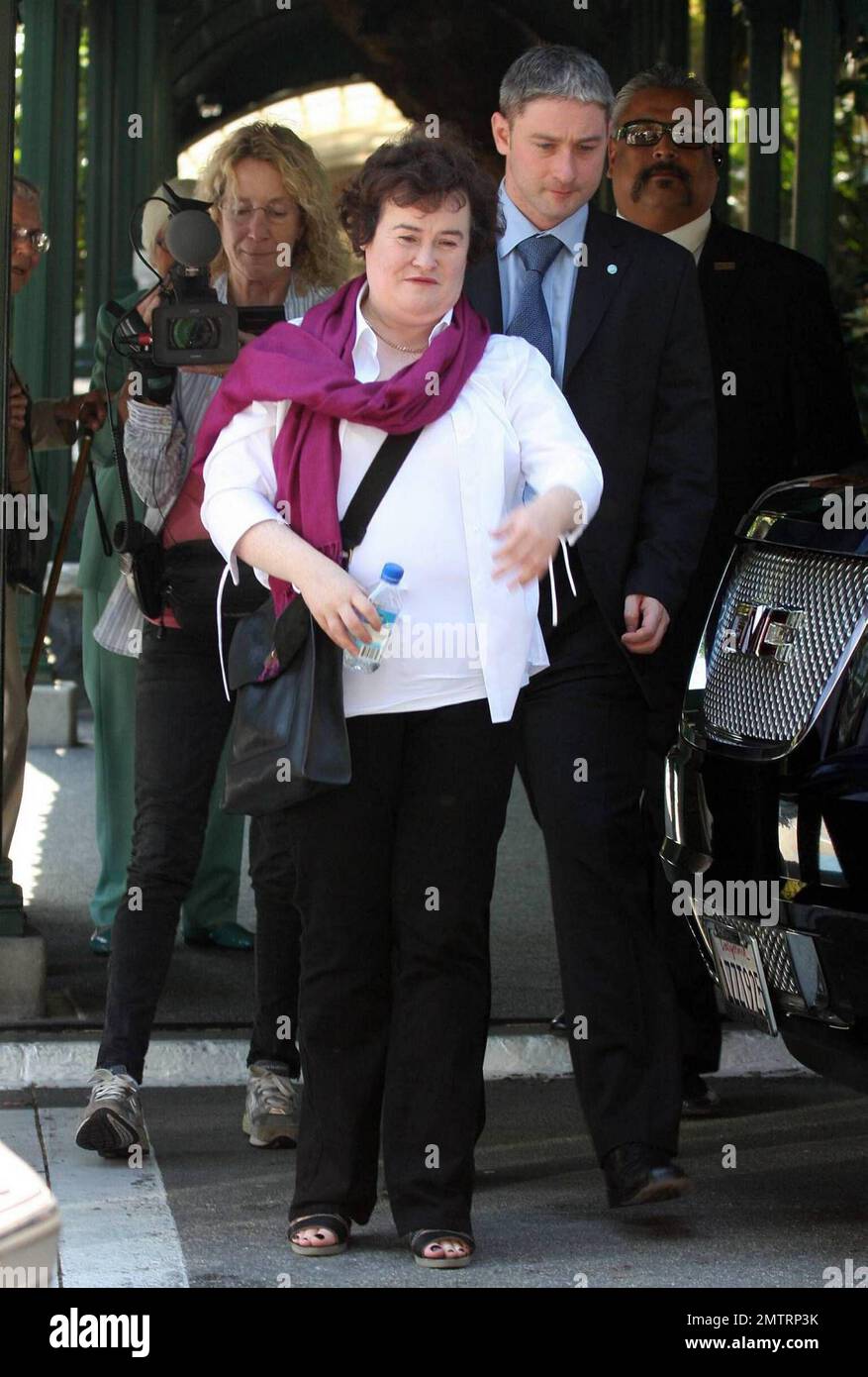 Susan Boyle is all smiles and seemingly playful as she arrives at her ...