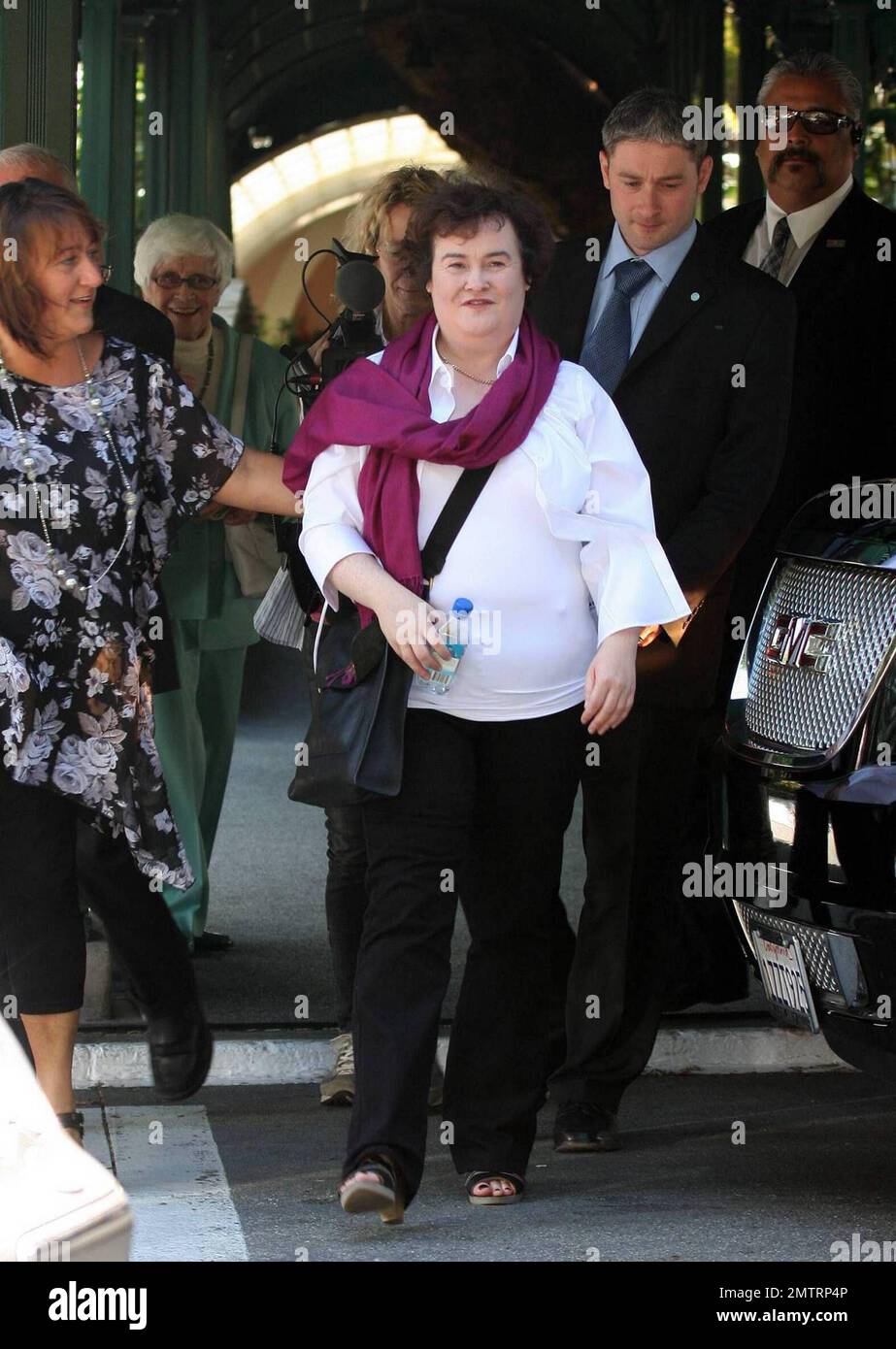 Susan Boyle is all smiles and seemingly playful as she arrives at her ...