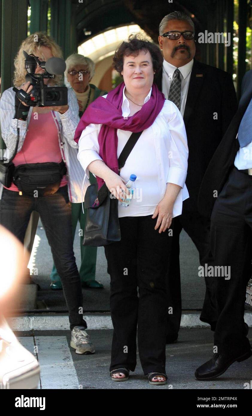 Susan Boyle is all smiles and seemingly playful as she arrives at her ...