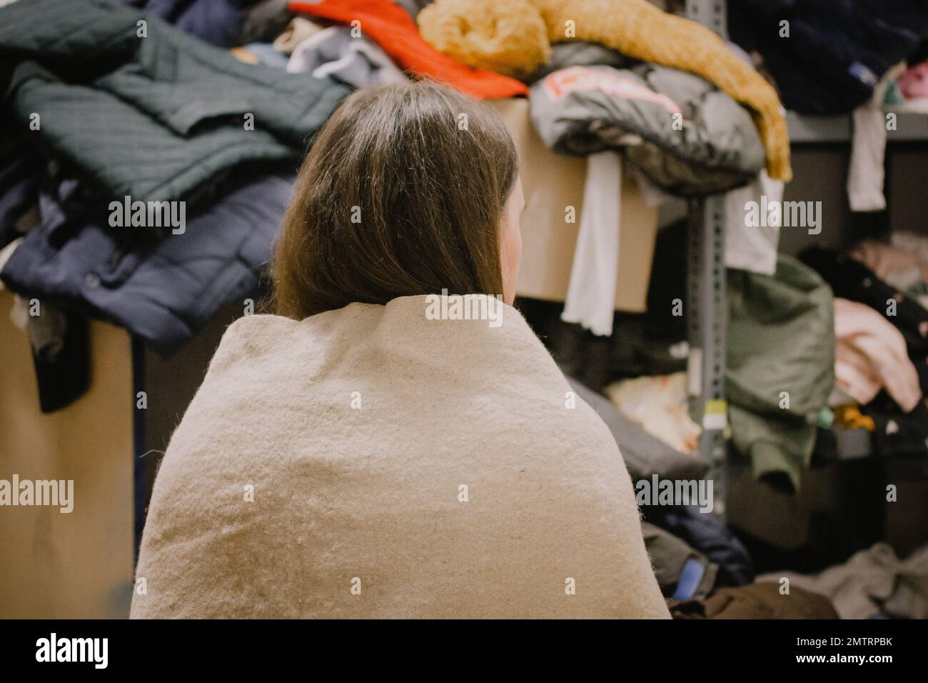 Poor homeless refugee woman needs help in humanitarian aid distribution ...