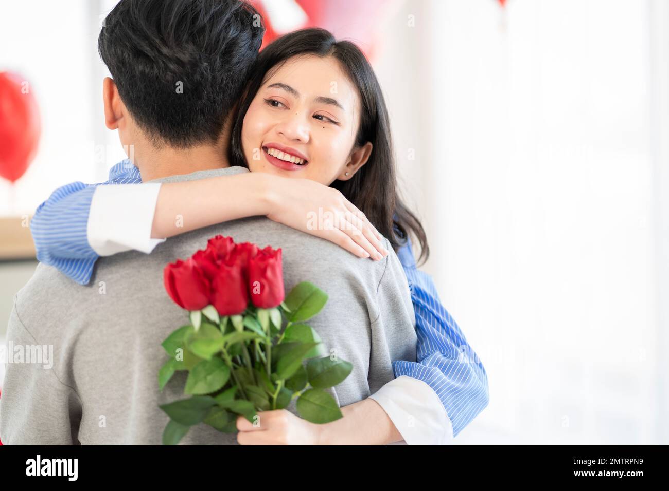 Asian couple Showing love surprise giving flowers or gifts to each ...
