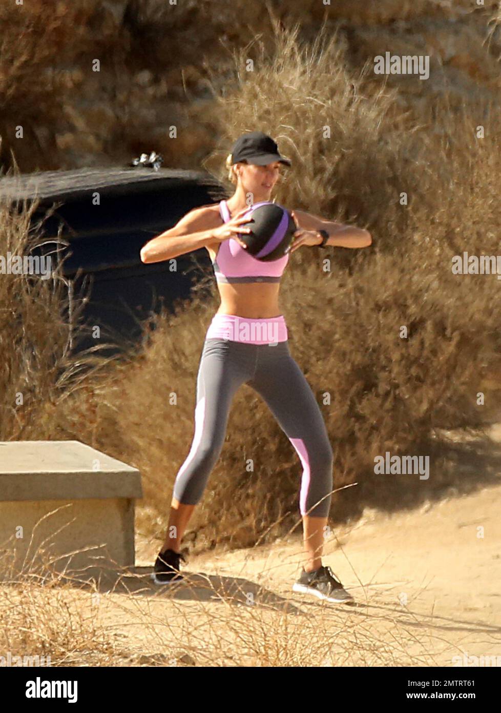 EXCLUSIVE!! Candice Swanepoel shows off her fine form during a photo ...