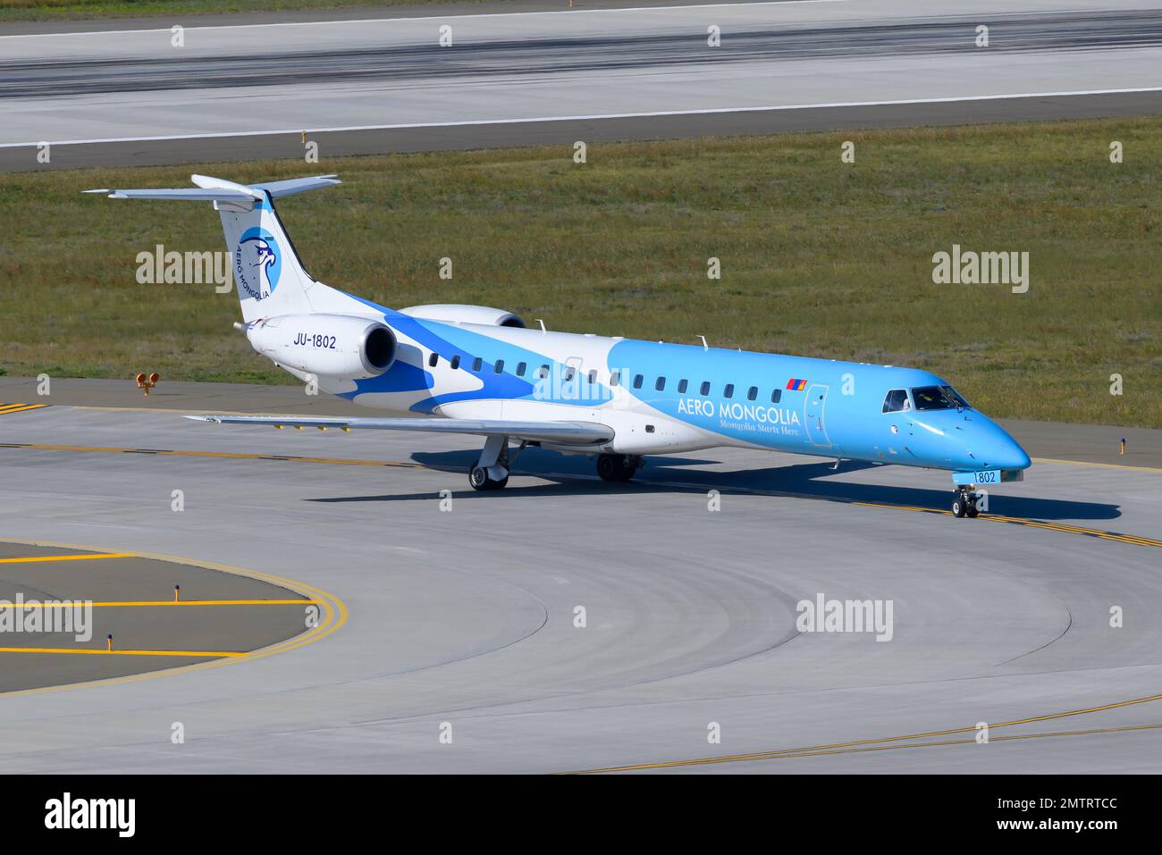 Aero Mongolia Embraer ERJ145 aircraft taxiing at Ulaanbaatar Airport ...