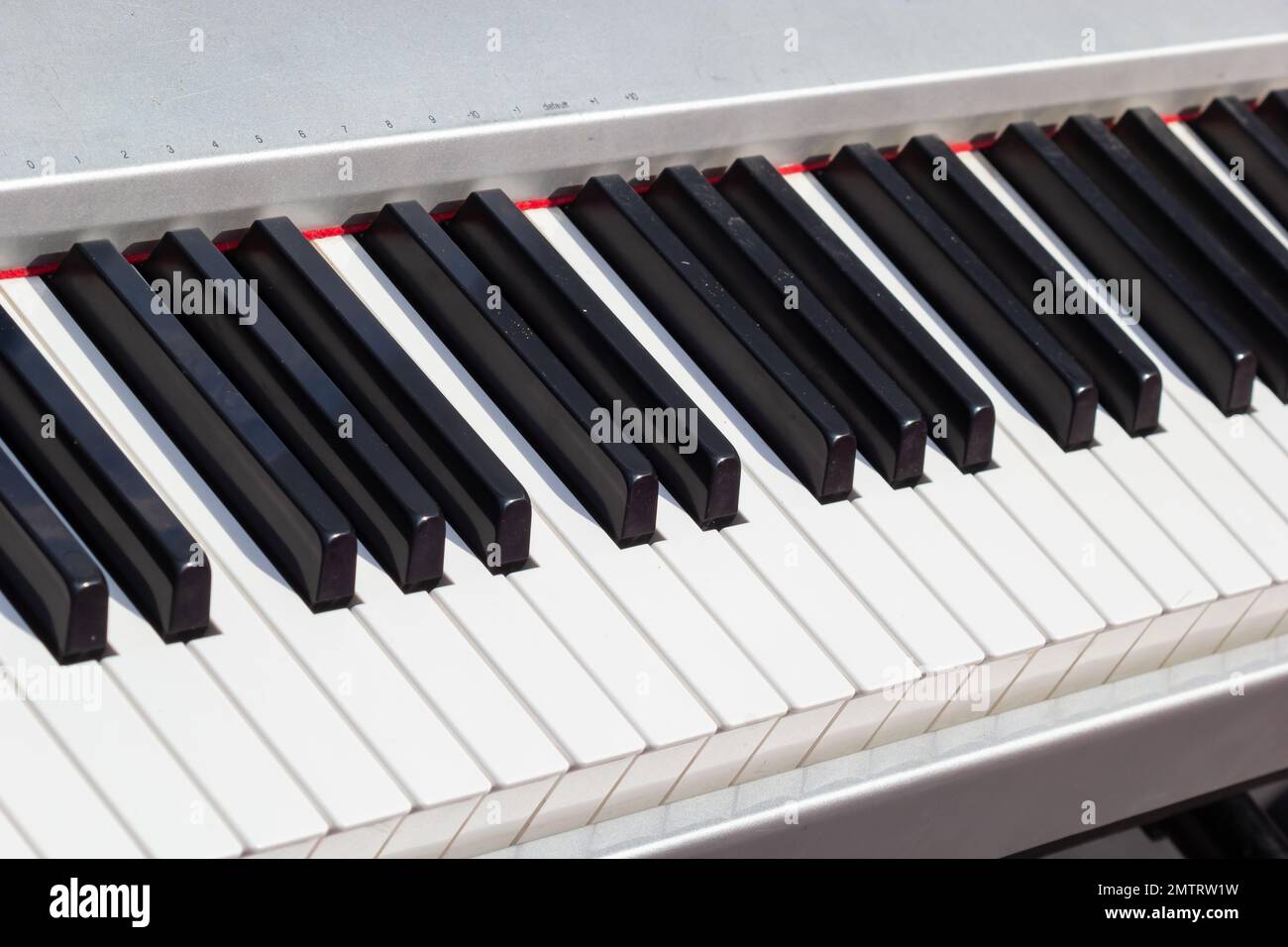 close-up of piano keys. close frontal view, black and white piano keys ...