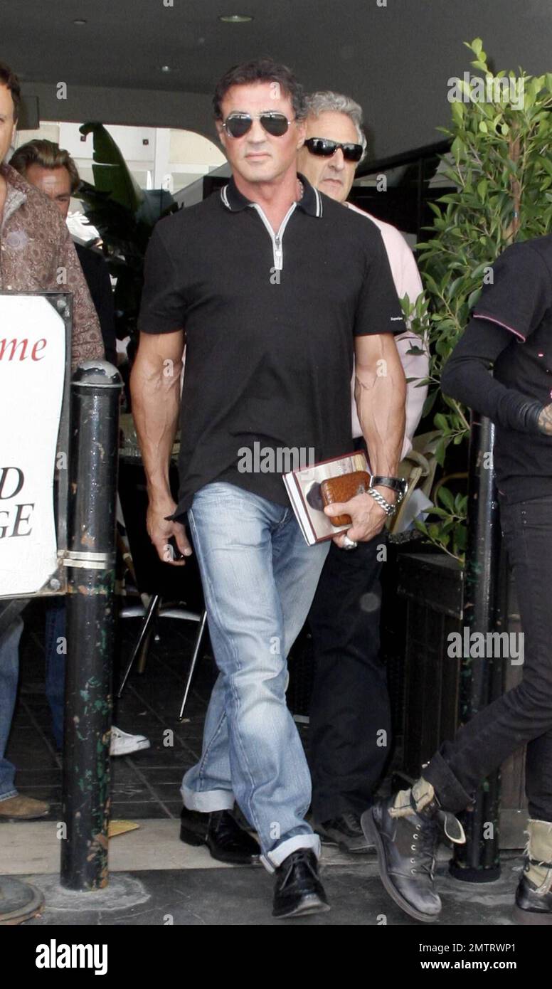 Sylvester Stallone leaves a Beverly Hills cafe with friends after ...
