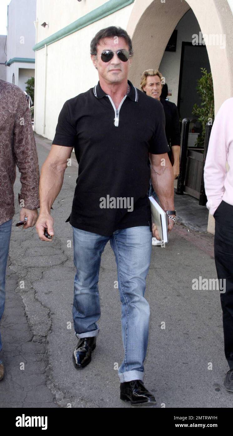 Sylvester Stallone leaves a Beverly Hills cafe with friends after ...