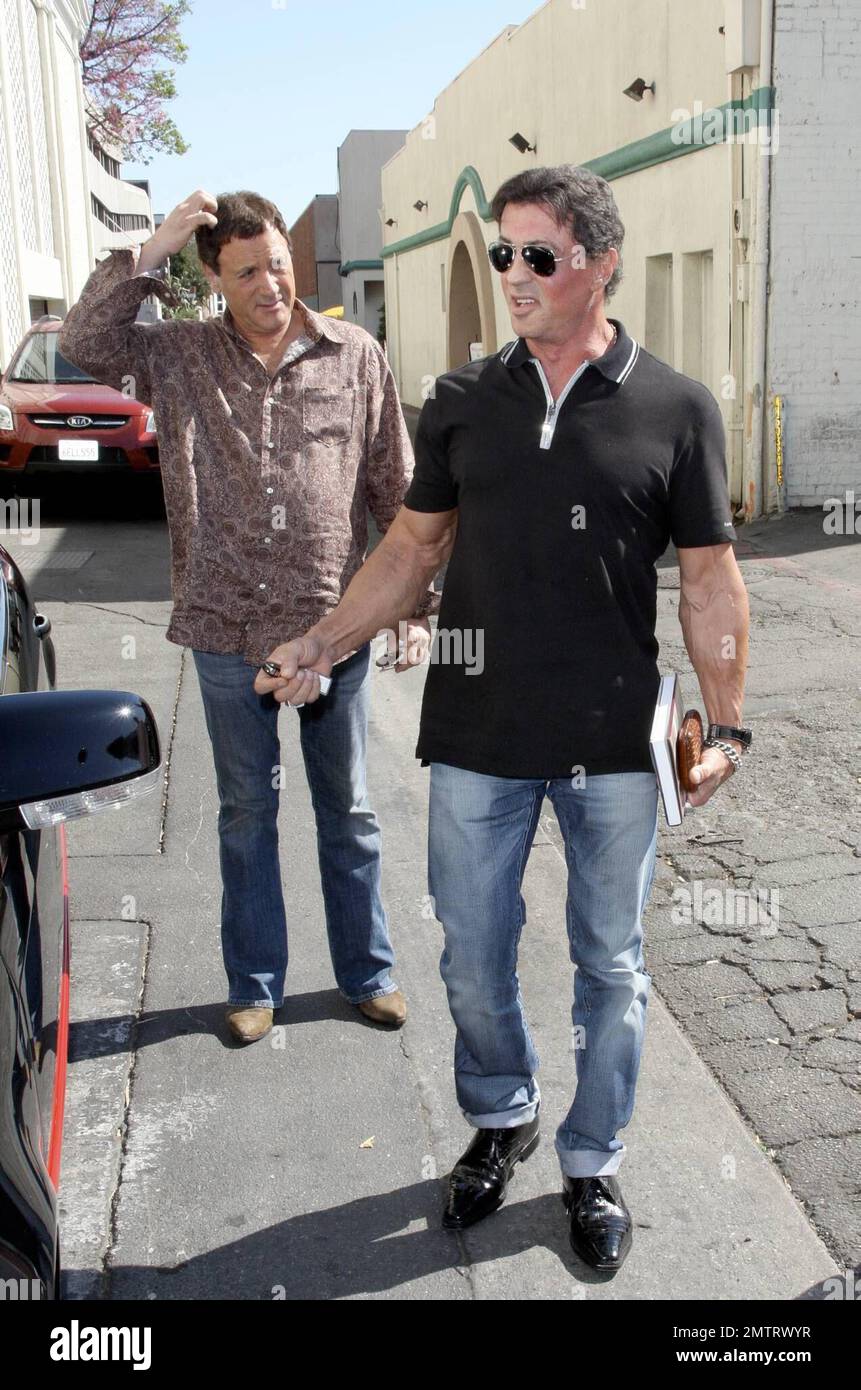 Sylvester Stallone leaves a Beverly Hills cafe with friends after ...