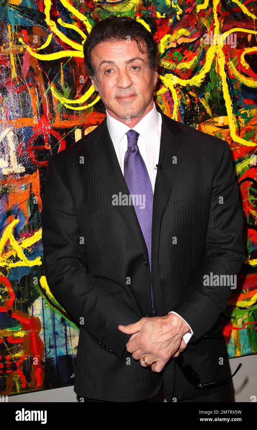 Actor Sylvester Stallone, accompanied by wife Jennifer Flavin, exhibits ...