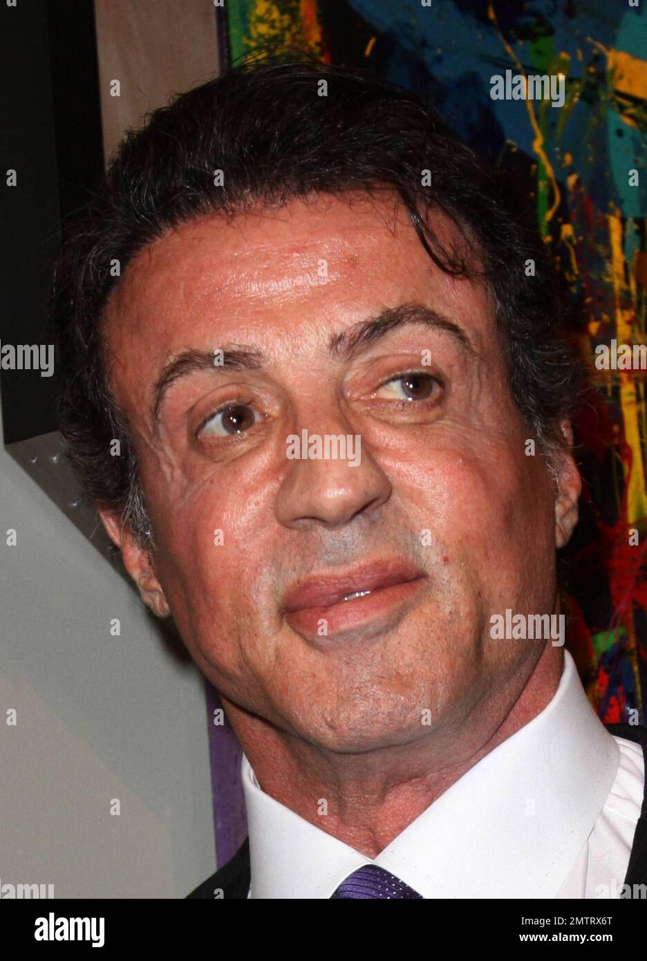 Actor Sylvester Stallone, accompanied by wife Jennifer Flavin, exhibits ...