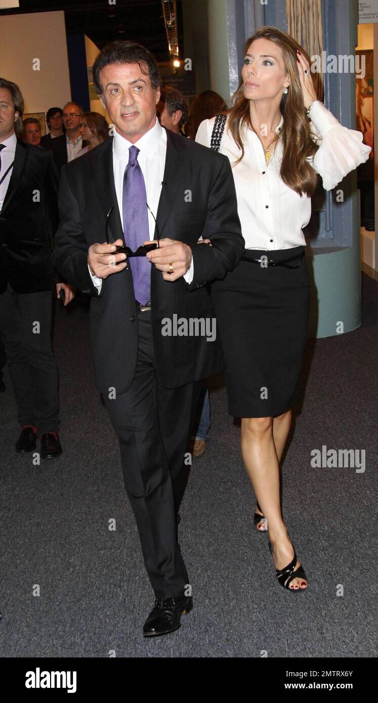 Actor Sylvester Stallone, accompanied by wife Jennifer Flavin, exhibits ...