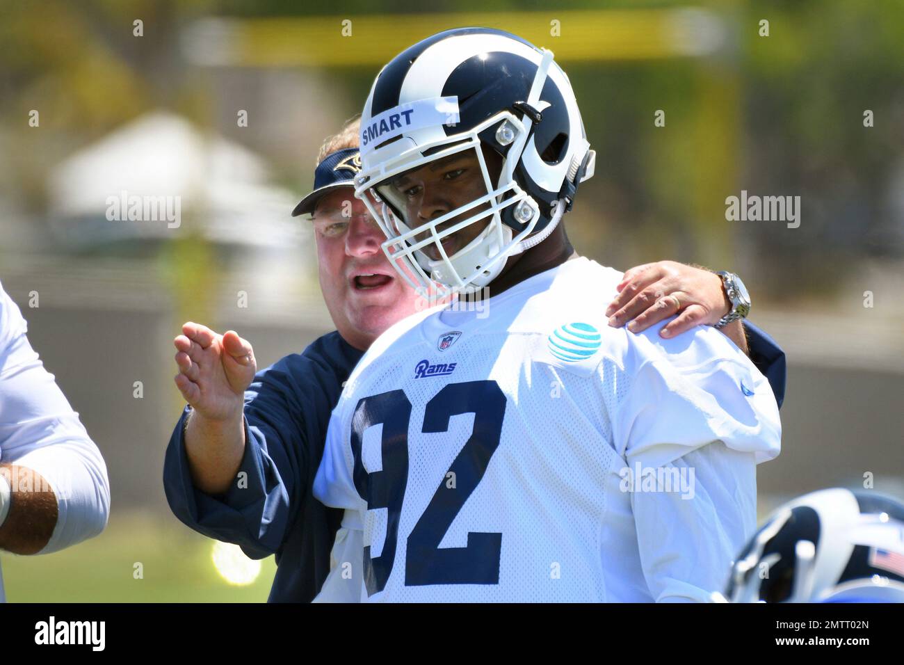 Los Angeles Rams defensive tackle Tanzel Smart (92) gets instruction ...
