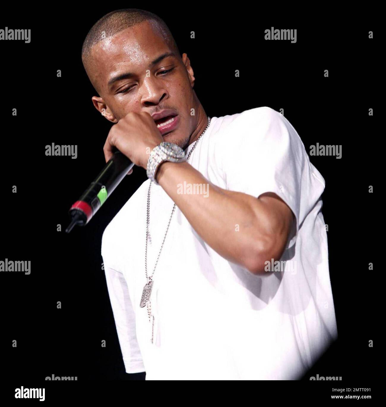 Rapper T.I. performs at the American Airlines Arena in Miami during his ...