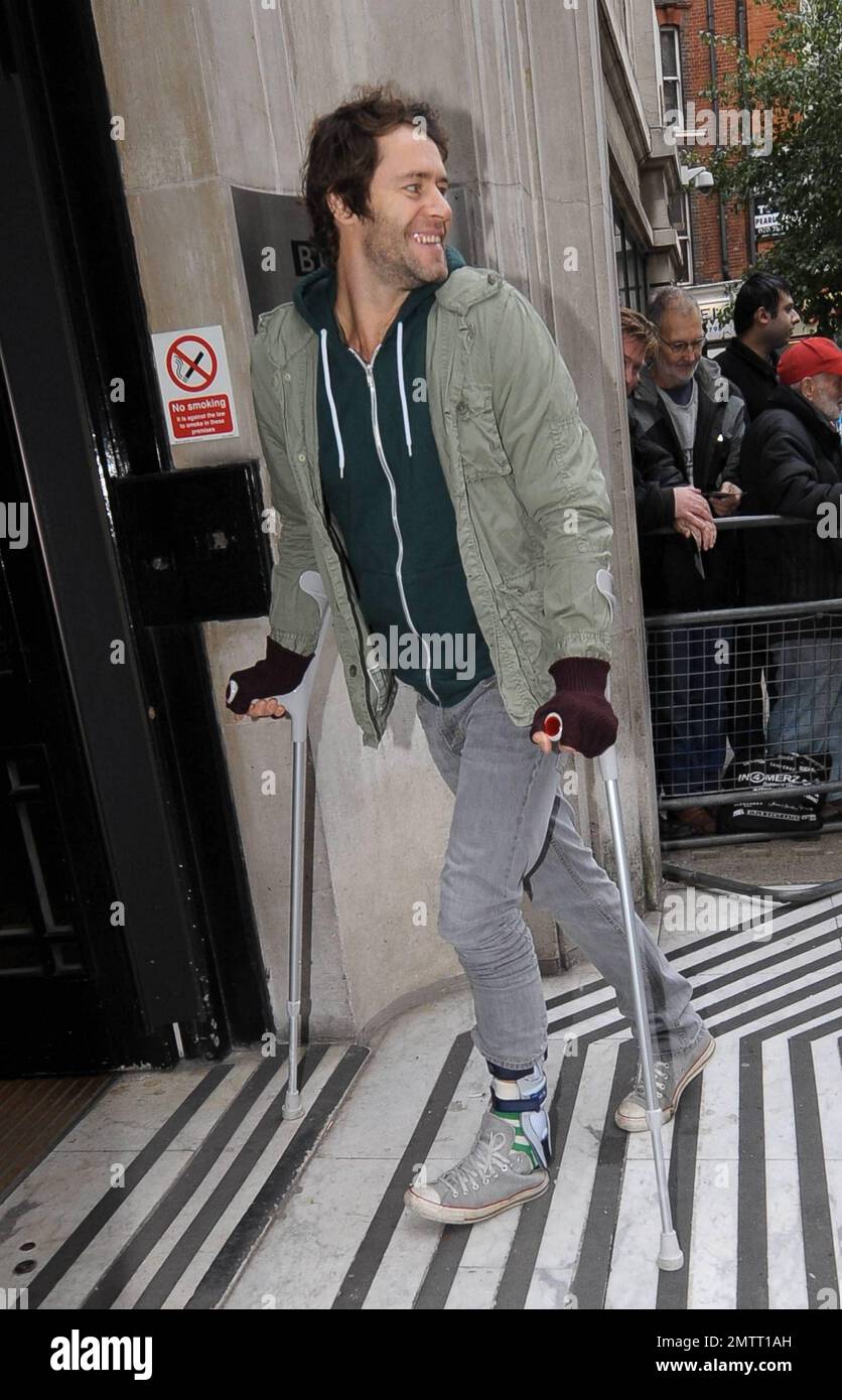 Robbie Williams and his Take That bandmates Gary Barlow, Howard Donald ...