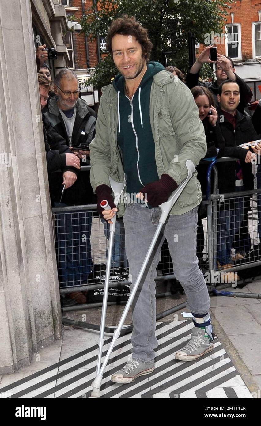Robbie Williams and his Take That bandmates Gary Barlow, Howard Donald ...