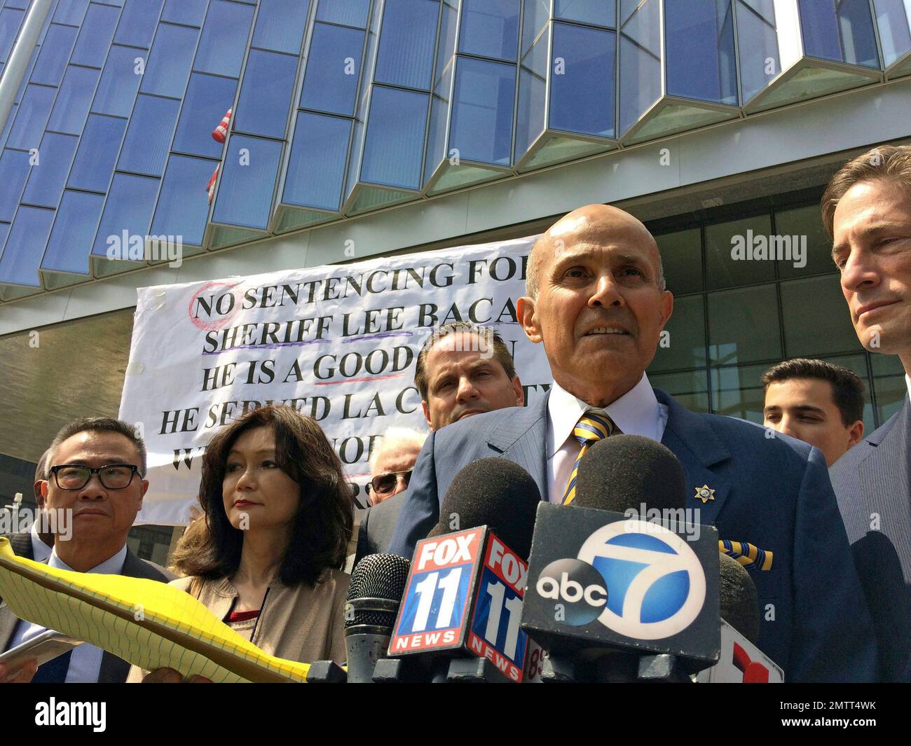Former Los Angeles County Sheriff Lee Baca speaks outside federal court ...