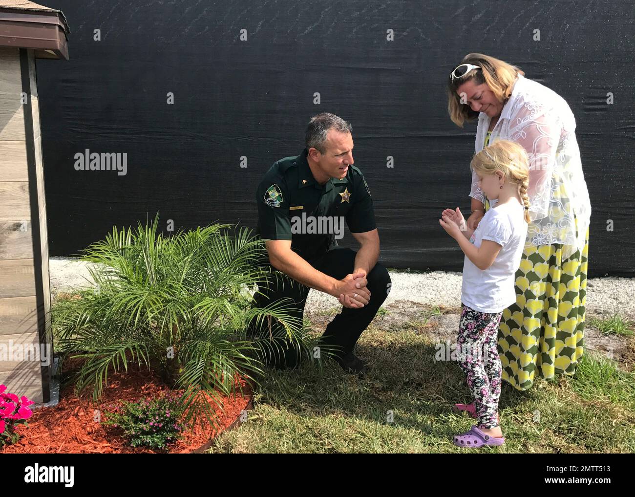 Pasco County Sheriff Chris Nocco speaks with Abigail Kennedy and her ...