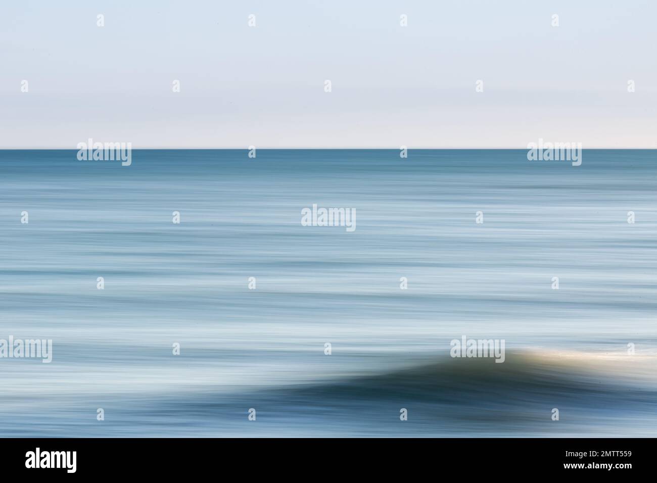 A view out over the ocean with intentional camera movement, and a clear ...