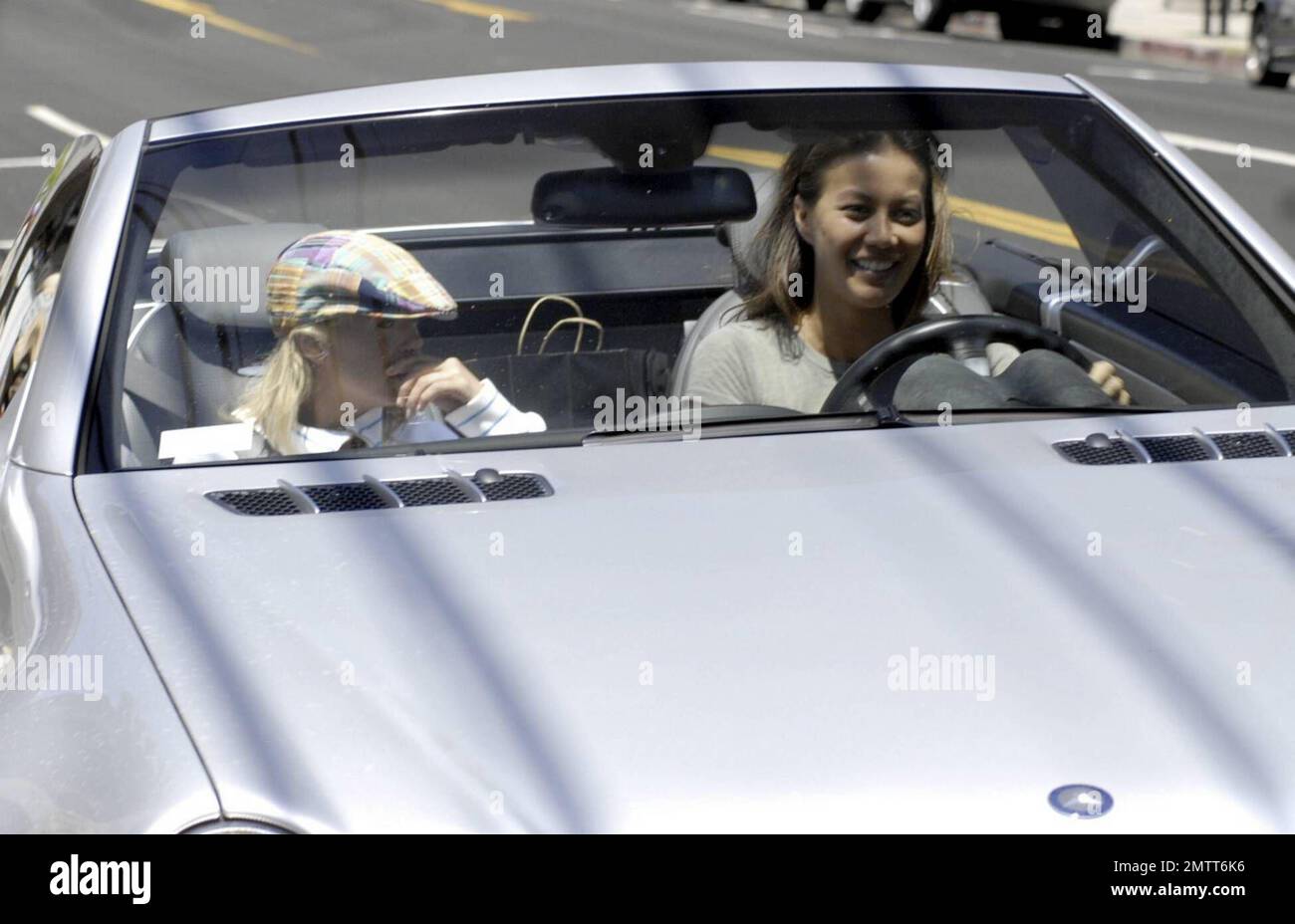 Tara Reid and a friend grab a bite at The Bread Bar. Tara is wearing ...