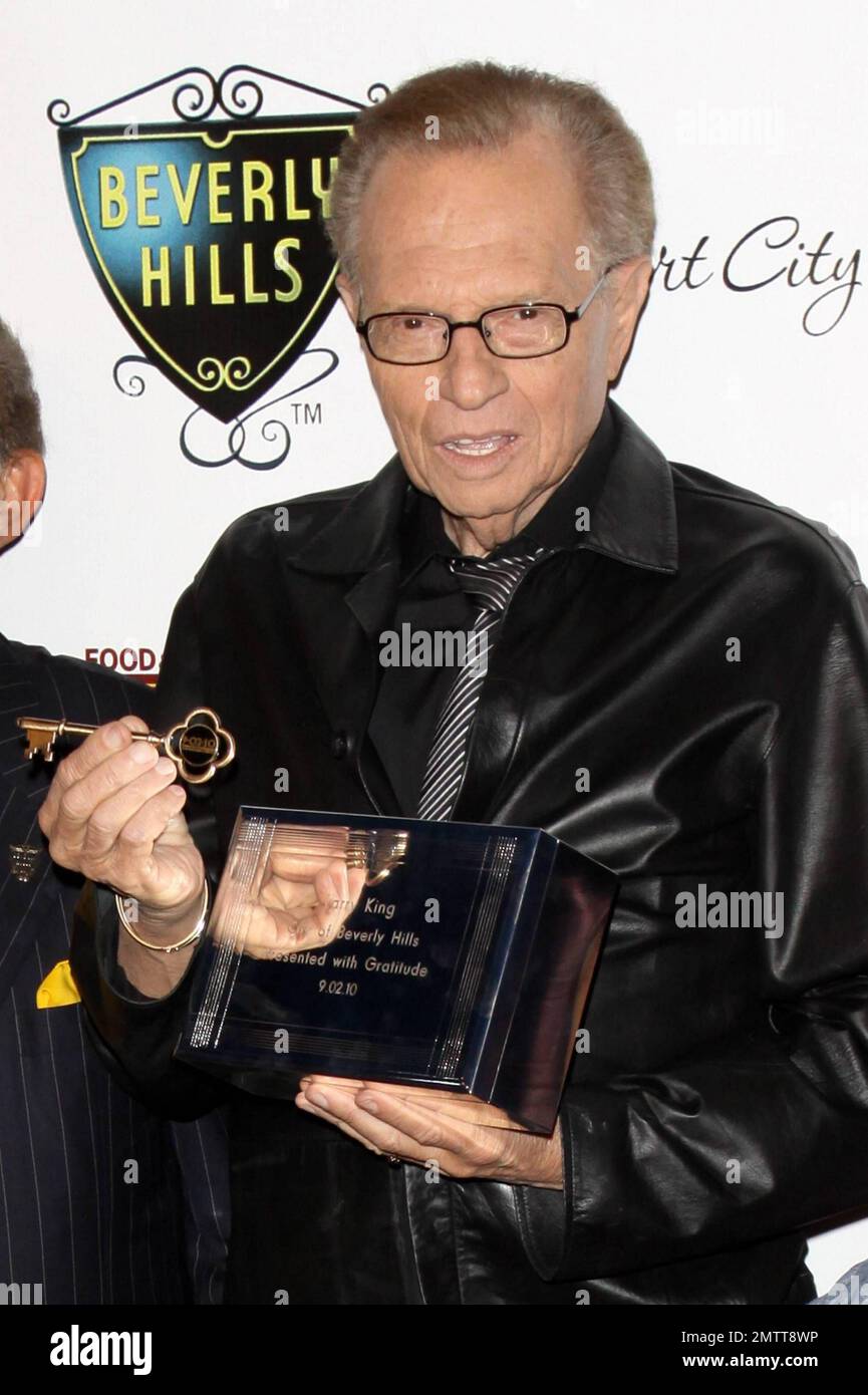 Larry King poses on the red carpet at Food & Wine presents the Taste of ...