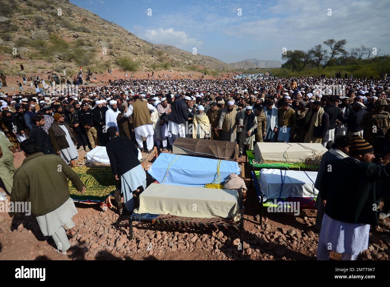 Kohat, Pakistan. 30th Jan, 2023. People attend the funeral of victims ...