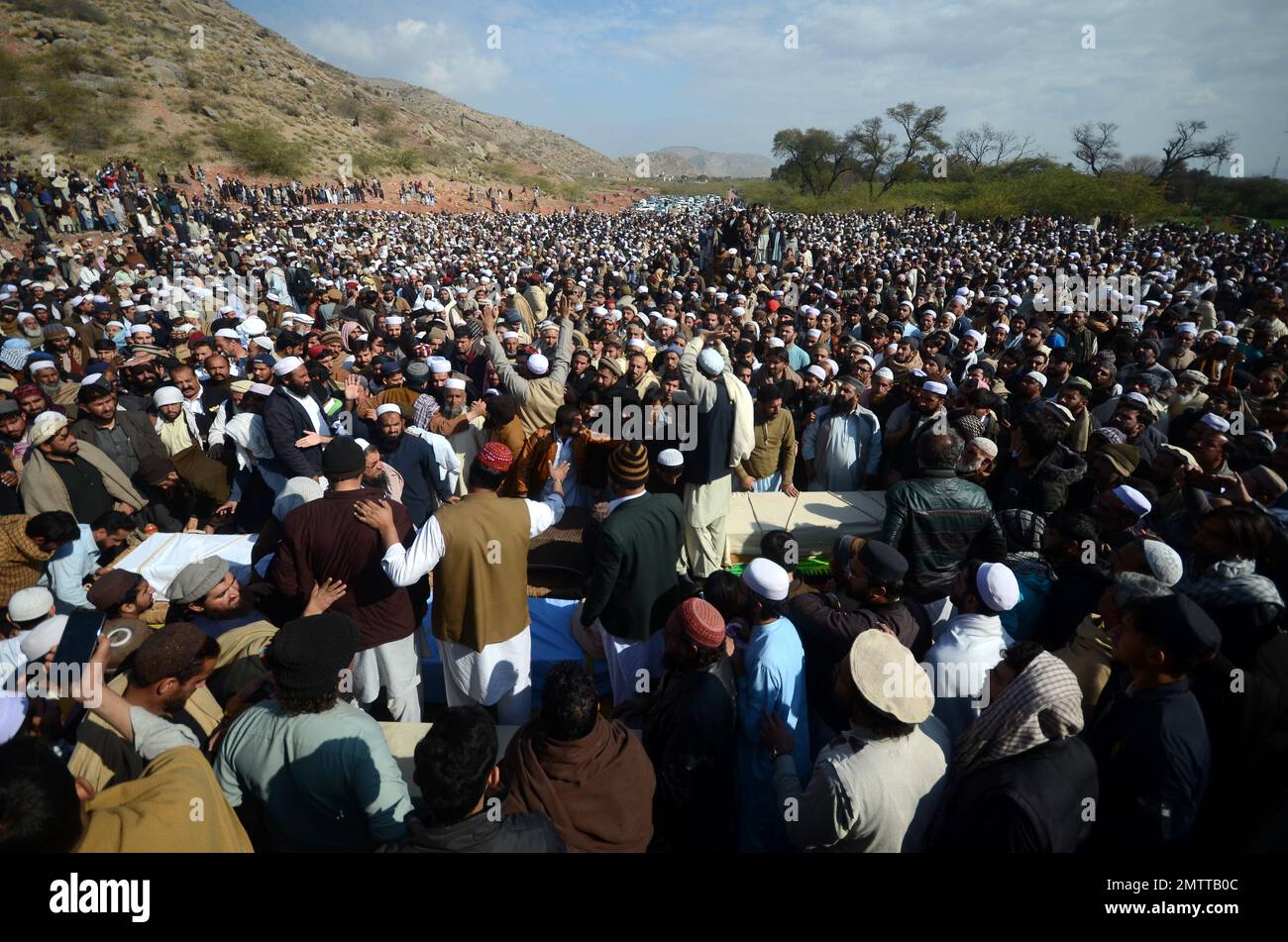 Kohat, Pakistan. 30th Jan, 2023. People attend the funeral of victims ...