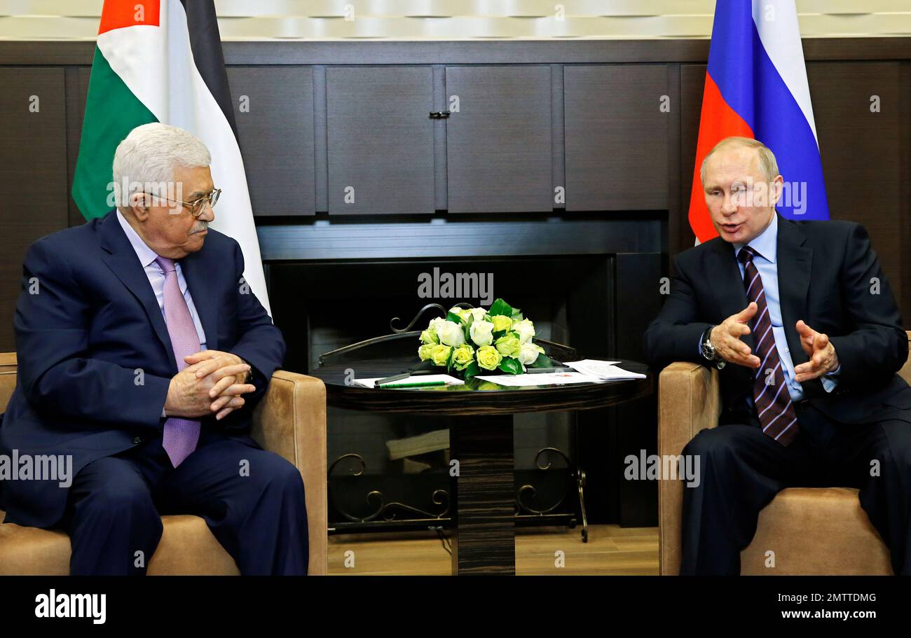 Russian President Vladimir Putin, right, speaks with Palestinian ...