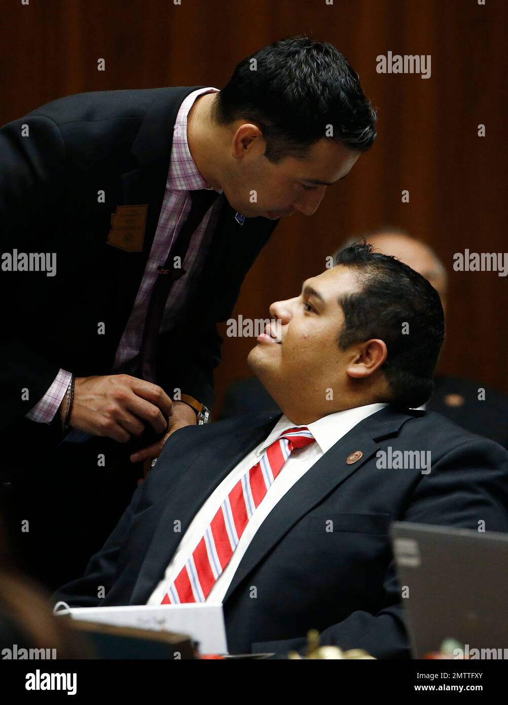 Arizona state Rep. Tony Navarette, left, D-Phoenix, talks with Rep ...